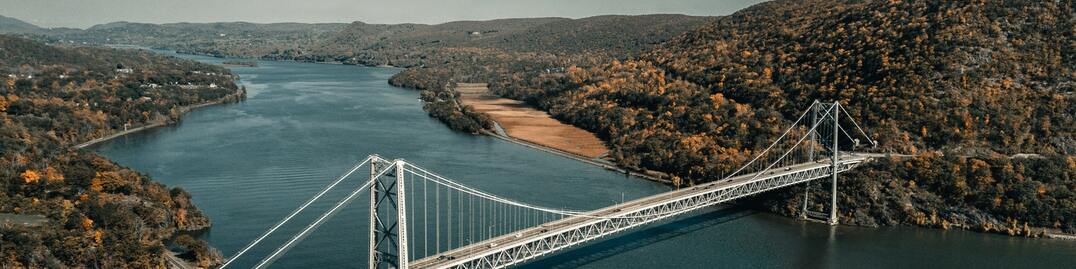 Gray Bridge With A Beautiful View Of The Lake And Trees - LinkedIn ...