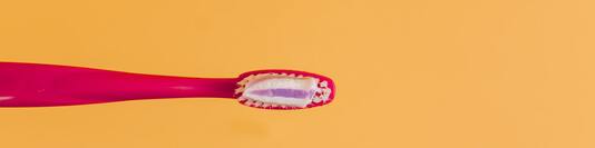 Red Toothbrush With Toothpaste In Yellow Background - LinkedIn ...